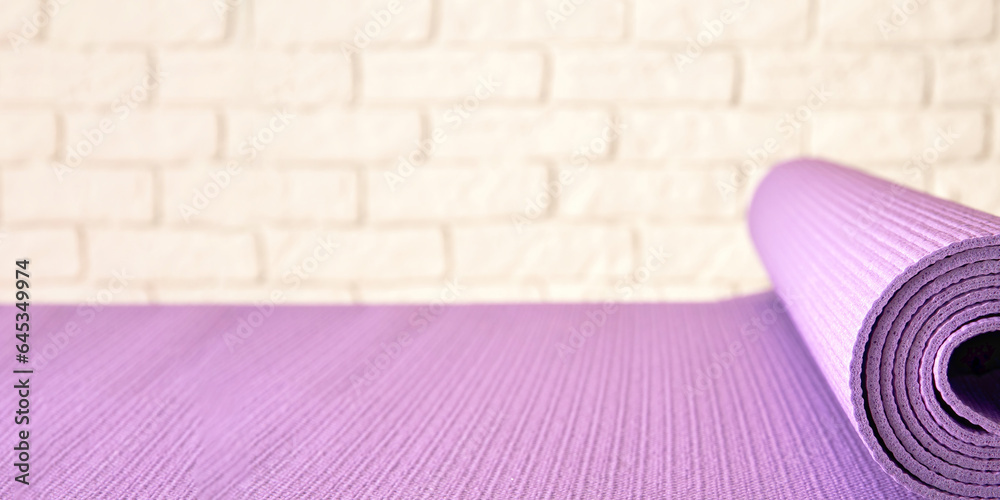 Fitness banner template with a long purple exercise mat and white brick ...