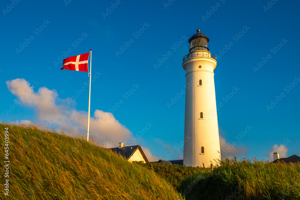 Iconic lighthouse of Hirsthals, Jutland, Denmark. The setting is ...