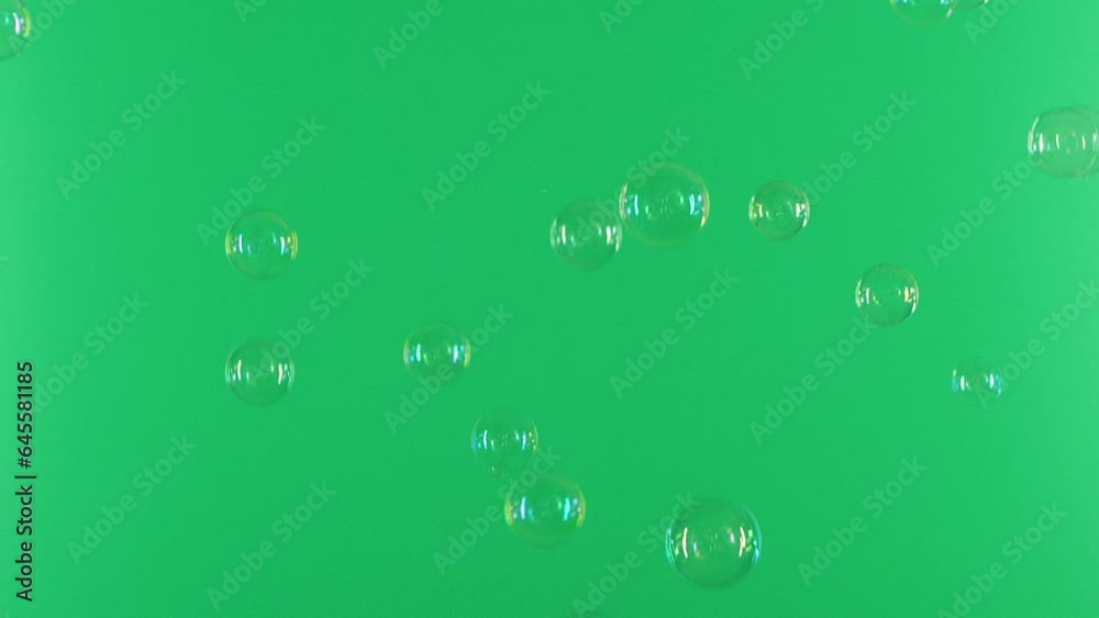 Slow motion of soap air bubbles texture on chroma key green screen ...