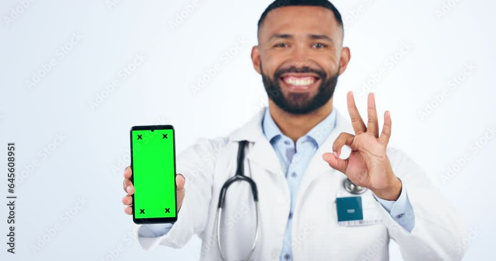Doctor, phone green screen and like, thumbs up or ok hands for ...