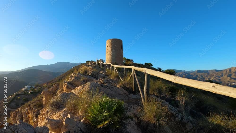 Mediterranean coastal landscape. Historic Torre Vigia De Cerro Gordo, a ...