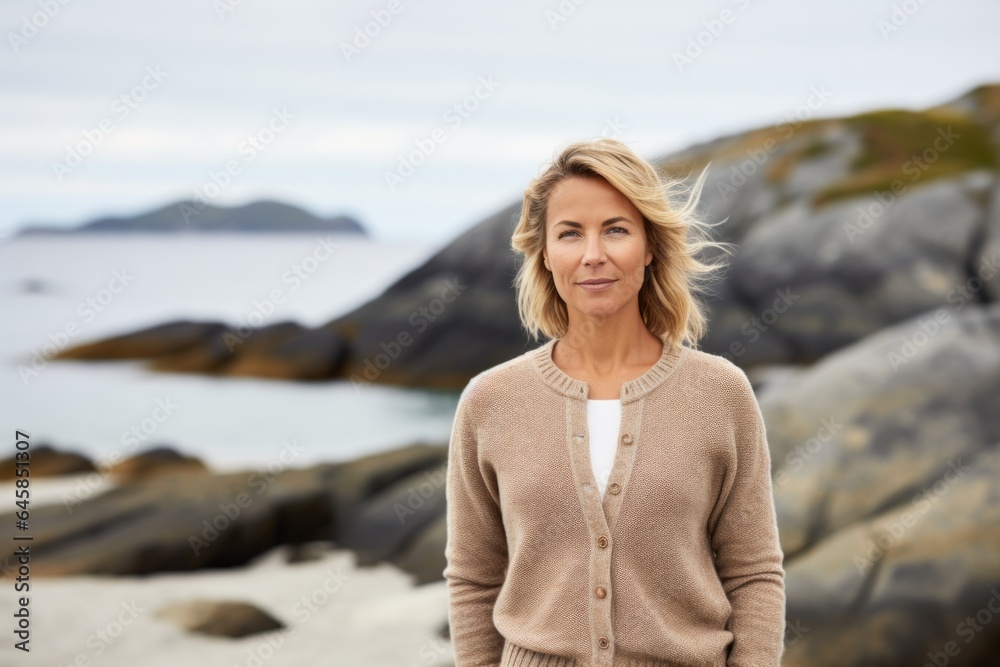 Lifestyle portrait photography of a Swedish woman in her 40s against a ...
