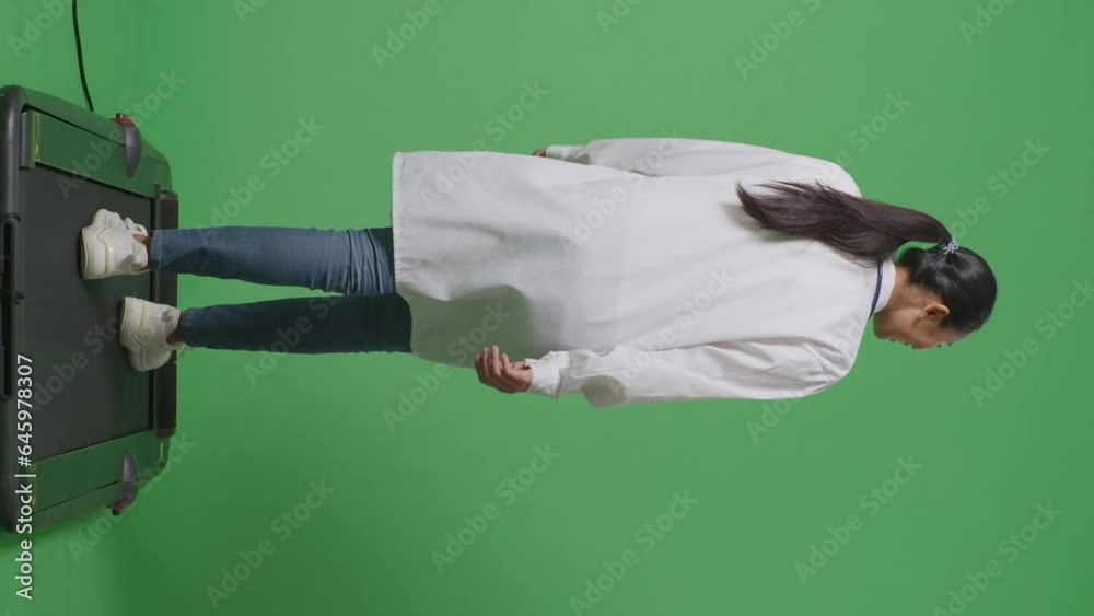 Full Body Of Back View Asian Female Doctor With Stethoscope Looking ...