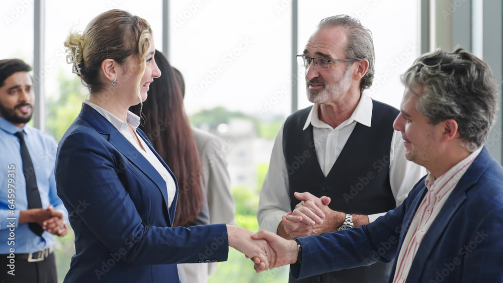 Caucasian man leader introducing woman manager to new team partner at ...
