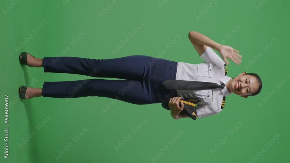 Full Body Of Asian Woman Pilot Smiling, Waving Hand, And Saying Bye ...