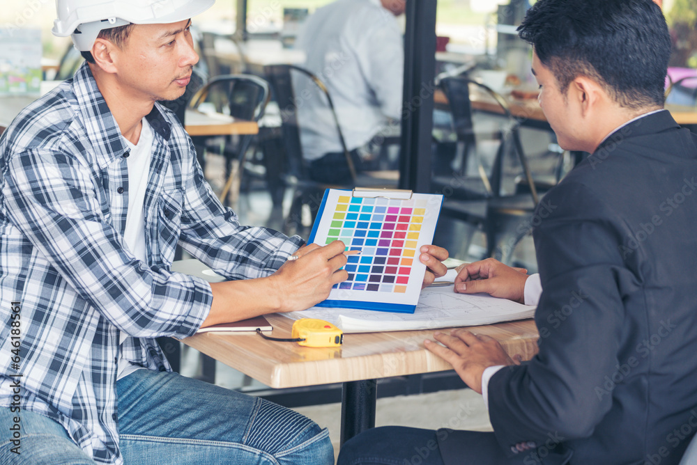 Asian interior designer team partner engineer brainstorming choosing ...