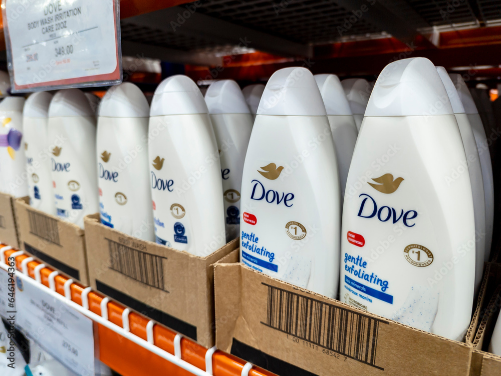 Dove body wash plastic bottles in rows at a local supermarket. Stock ...