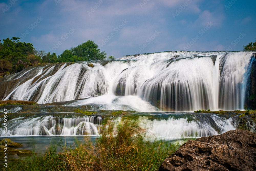 Steep slope pond big waterfalls Stock Photo | Adobe Stock