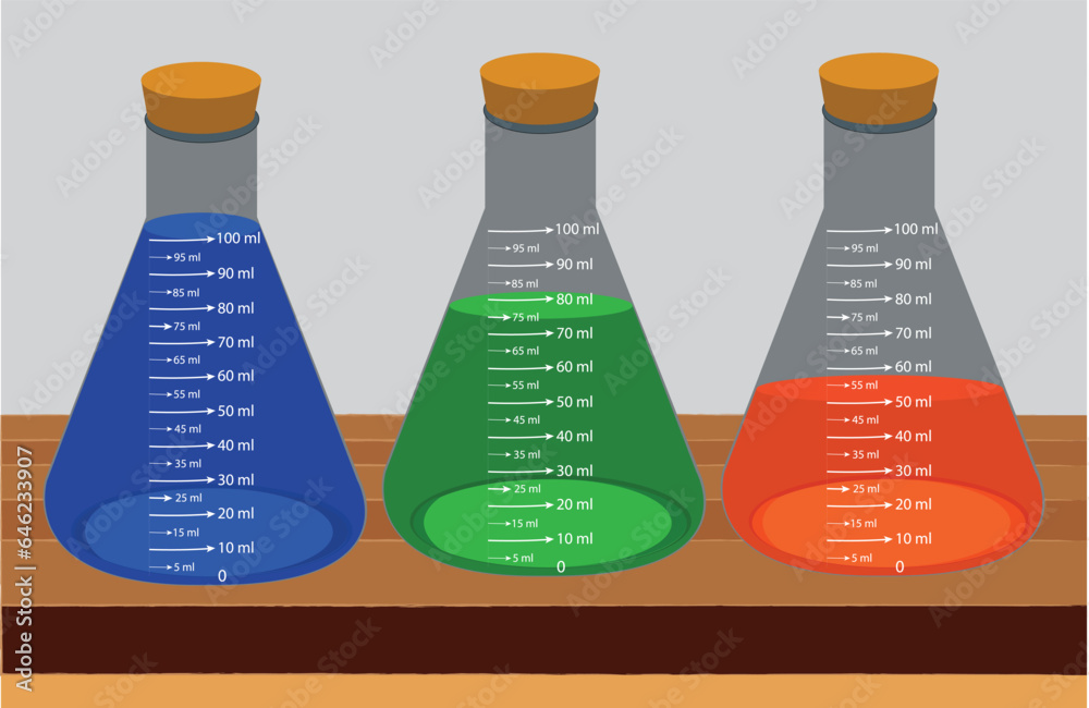 Glass laboratory chemical measuring flasks. with colorful liquids in ...