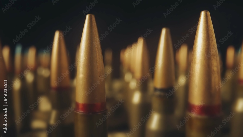 Endless rows cartridges for a rifle on a black background close up ...