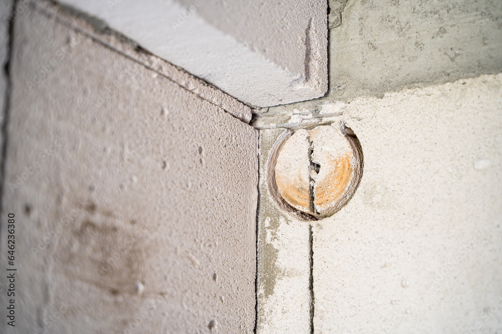 Cutting out a place for wiring and a socket in a wall of aerated ...
