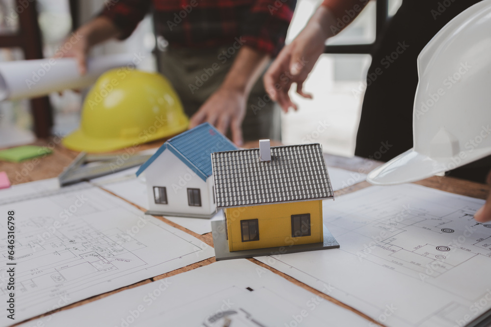 Group architects and engineers build houses and conference buildings ...