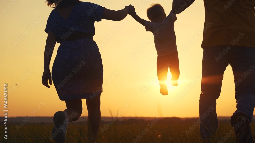 family running in the park. mother and father a run with baby in nature ...