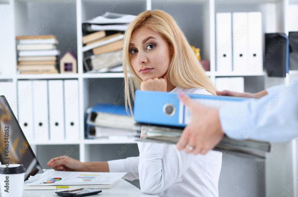 Female employee show pack of documents to busy manager or boss give ...
