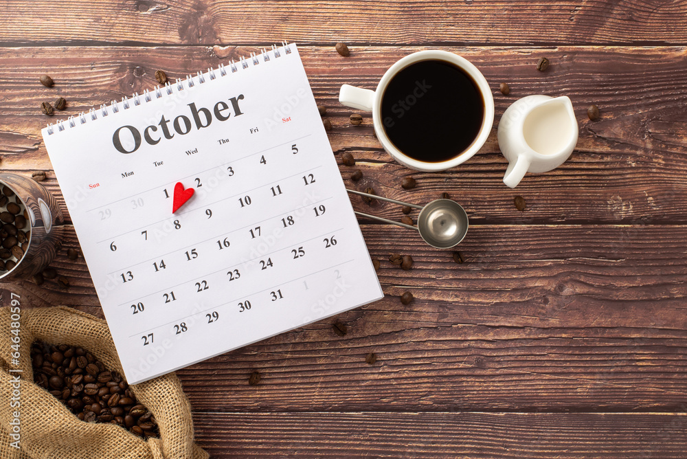 Send your Coffee Day wishes. Top view of calendar with highlighted 1st ...