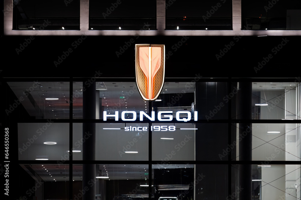 Hongqi brand logo on car dealership building facade Stock Photo | Adobe ...