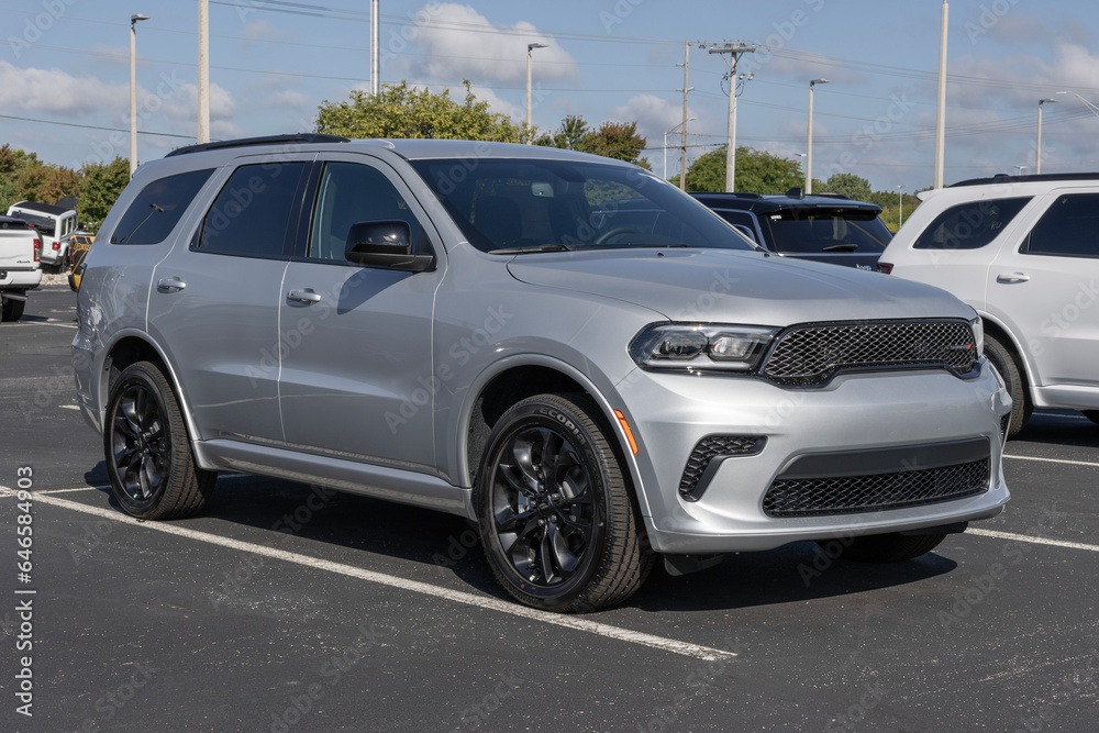 Dodge Durango display at a Stellantis dealership. Dodge offers the ...