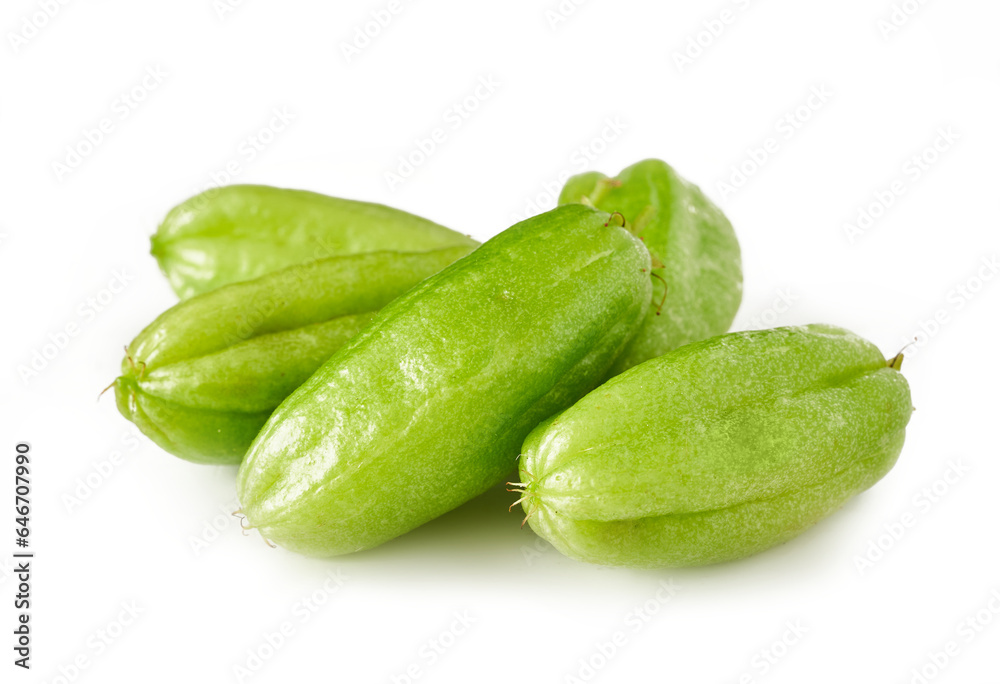 green bilimbi kamias fruit isolated on white background. pile of green ...