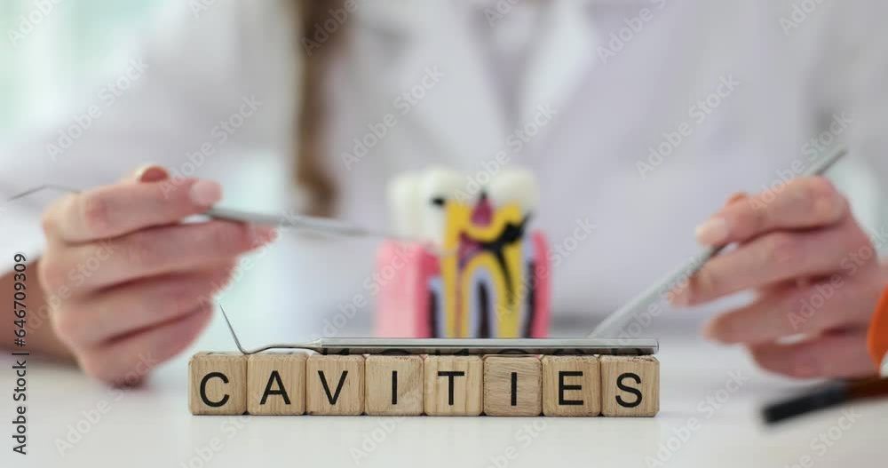 Dentist word caries and dental treatment. Complex slow moving ...