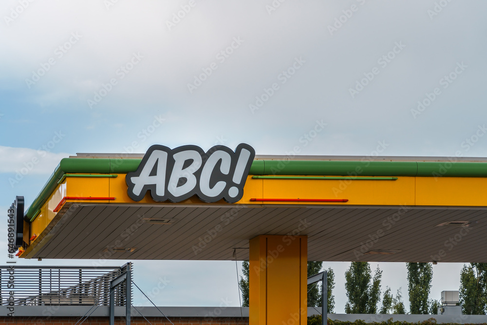 Abc gas station logo with overcast sky background in Lahti, Finland. Stock Photo | Adobe Stock