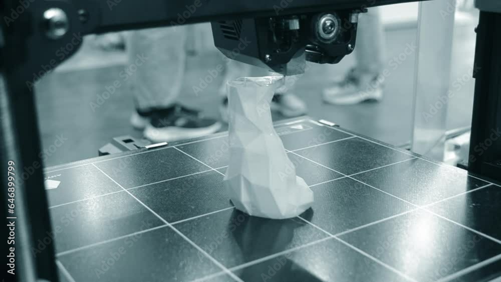 Abstract object printing on 3D printer with molten plastic close-up. 3D ...