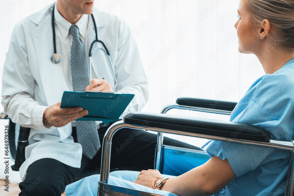 Doctor in professional uniform examining patient at hospital or medical ...