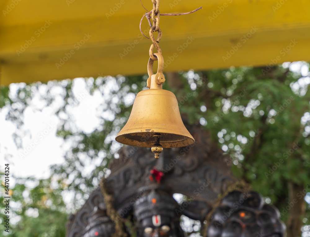 Old bronze bell in indian temple with blur background. Hindu temple ...