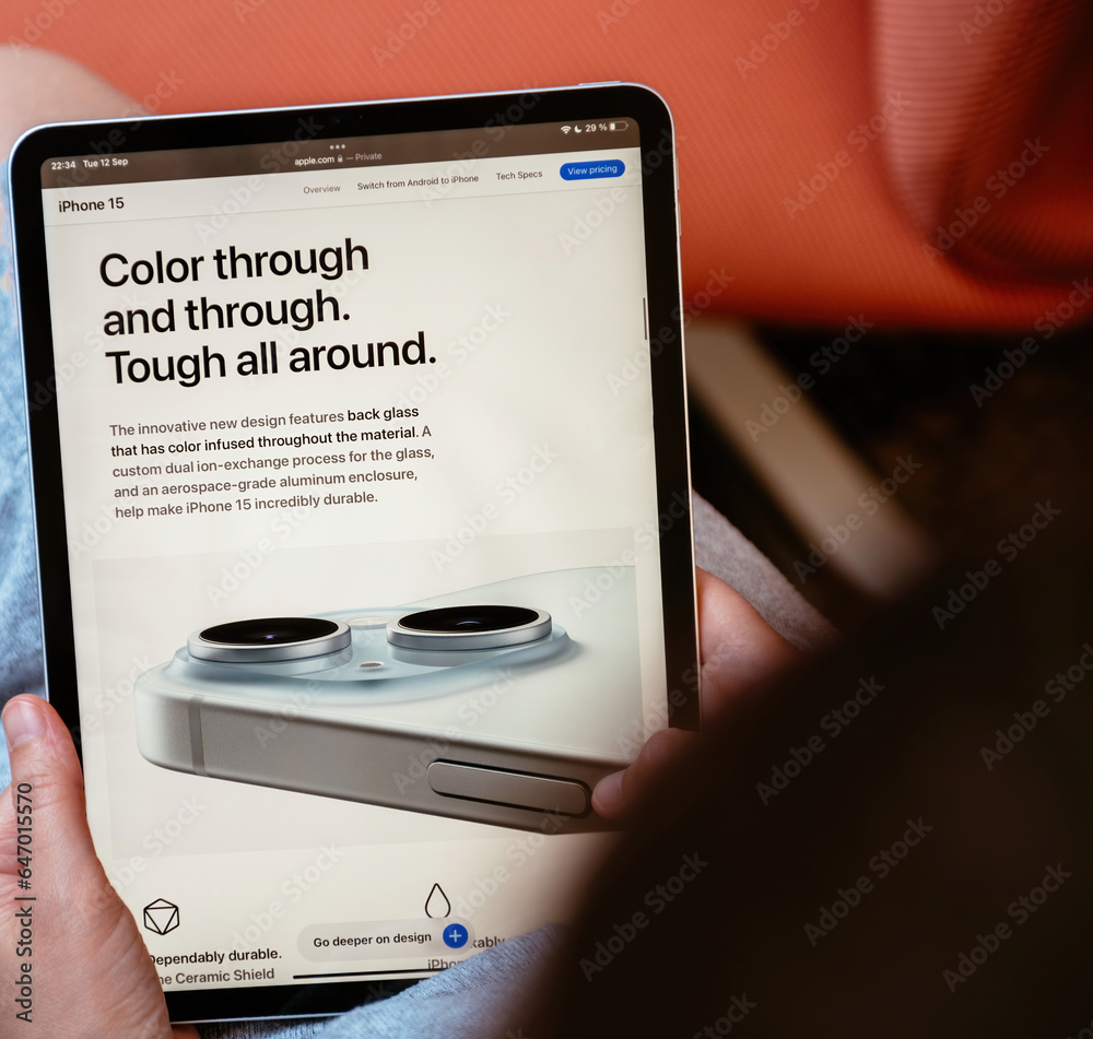 London, UK - Sep 13, 2023: woman explores features on , discovering the ...