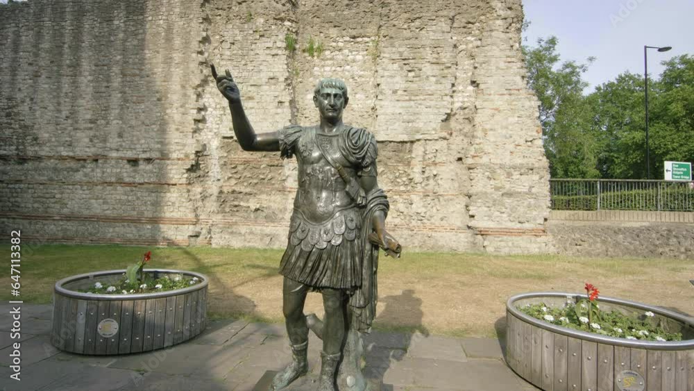 Statue of Roman Emperor Trajan. Camera flying in. Outdoor twentieth ...