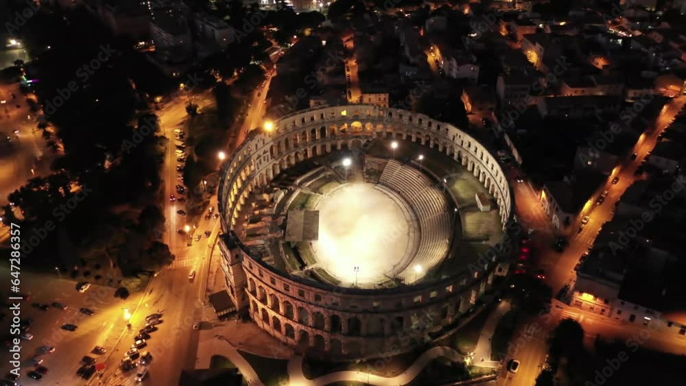 Amphitheatre in Pula, Croatia, night aerial view. Historic centre of ...