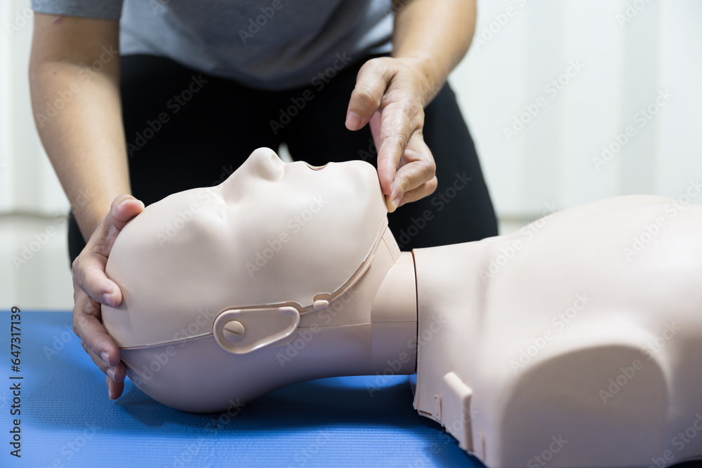 Demonstrating CPR (Cardiopulmonary resuscitation) training medical ...
