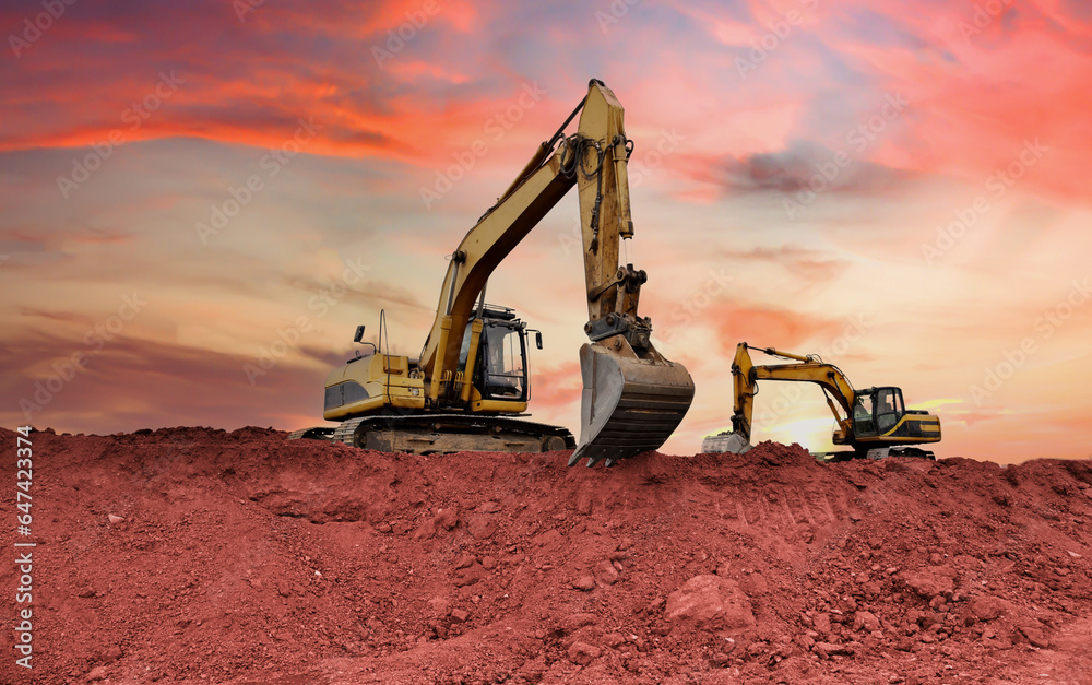 Excavator on earthmoving at open pit mining. Backhoe dig ore in quarry ...