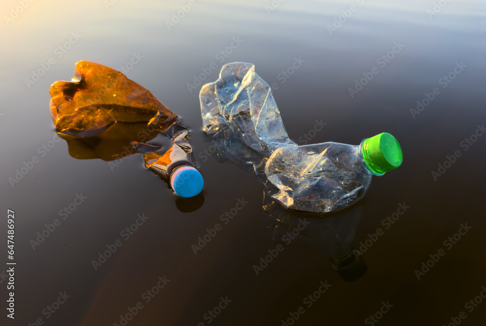 Marine plastic pollution. Plastic waste in lake water. Wastewater ...
