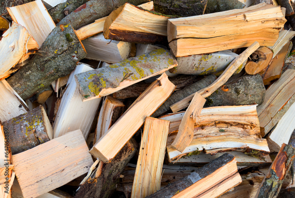 Firewood background. Chopped firewood close up. Chopping wood and ...