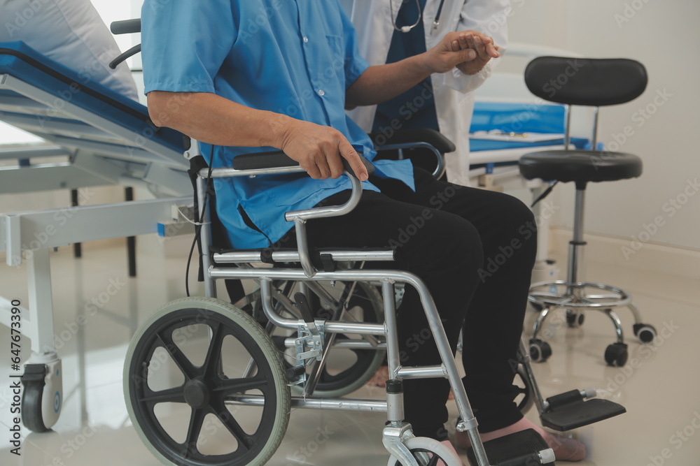 Asian older aged man doing physiotherapist with support from nurse ...