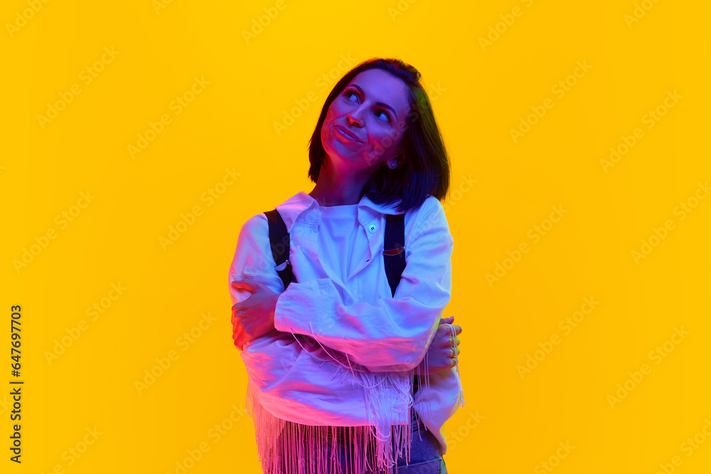 Portrait of beautiful woman in her 30s wearing white stylish shirt and ...