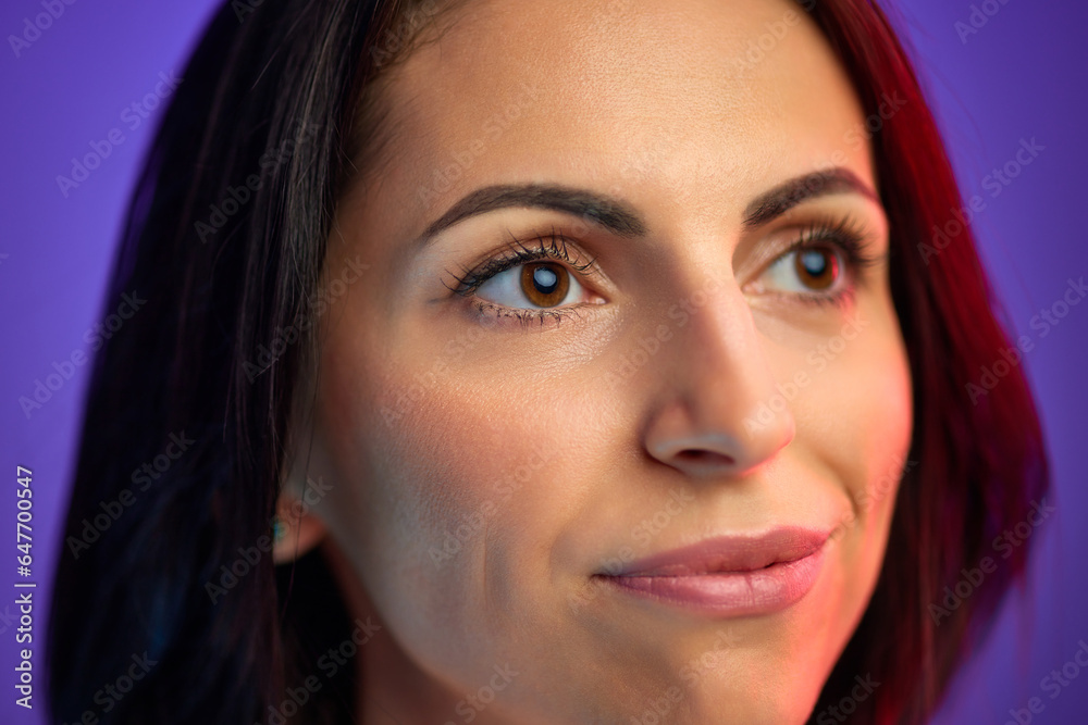 Portrait of beautiful woman in her 30s with short hair, looking away ...