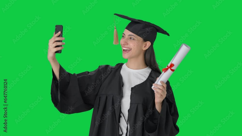 Happy Indian college graduate girl clicking selfies Green screen vídeo ...