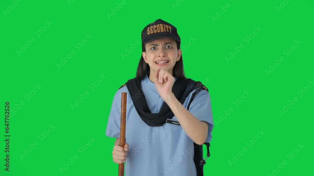 Angry Indian female security guard arguing with someone Green screen ...