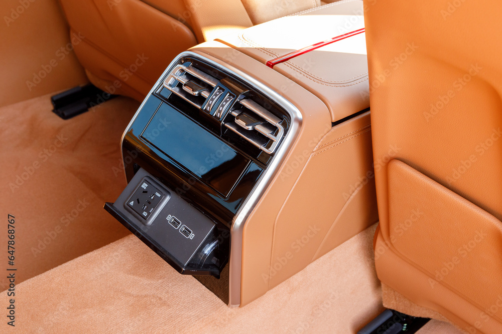 Air-condition panel in interior of a new car. Two USB C ports for the ...
