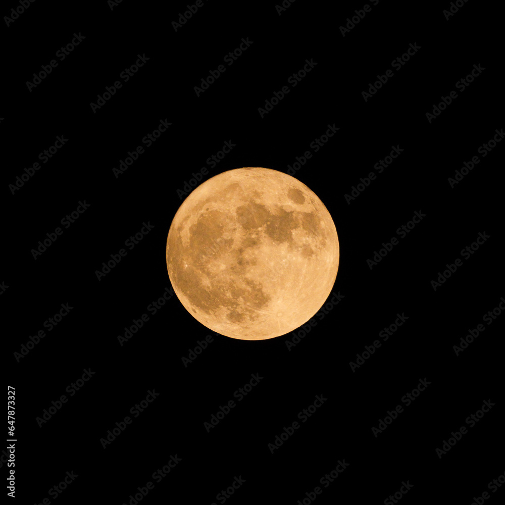 epic shot of supermoon during the night showing craters and details of ...