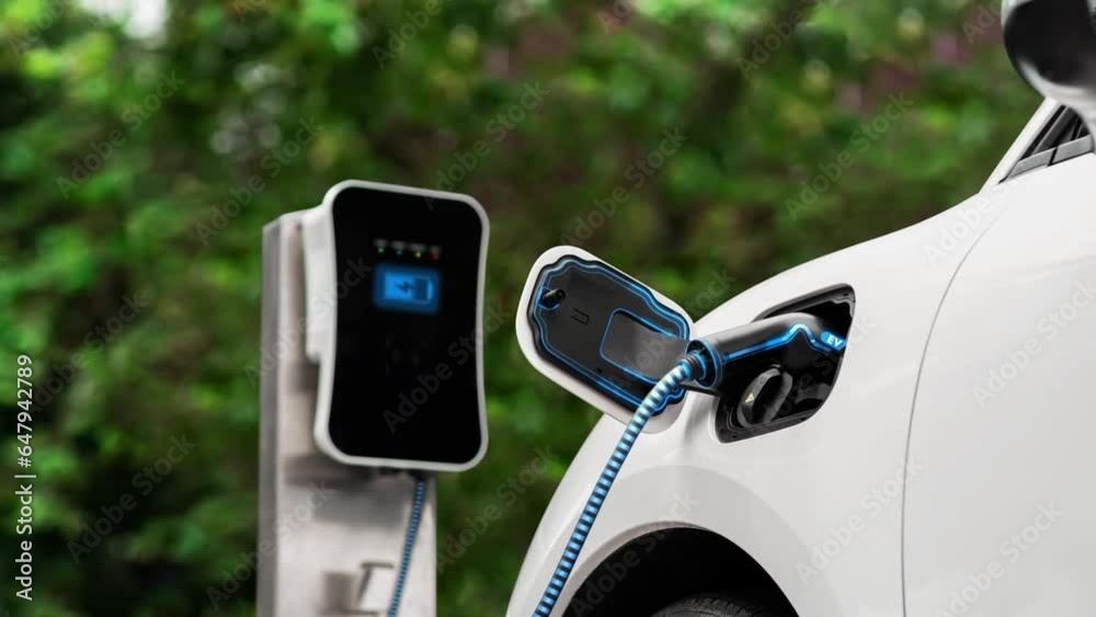 Electric car recharging battery by futuristic smart EV charger from eco ...