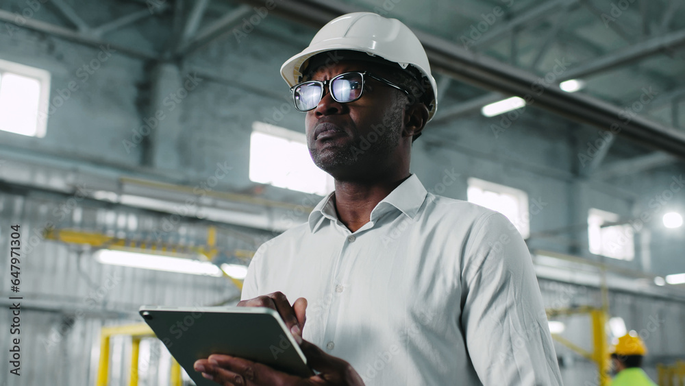 Foto de Careful concerned hard-working African-American male wearing ...