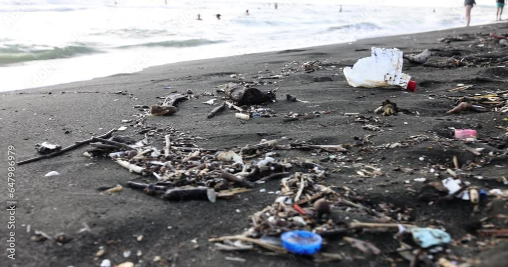 Sand beach polluted by tourists in seaside resort. Lack of care of ...
