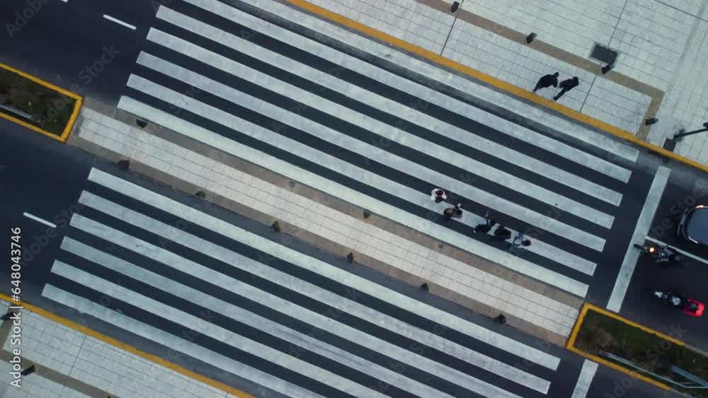 People cross a zebra crossing, pedestrian crossing, top view, drone ...