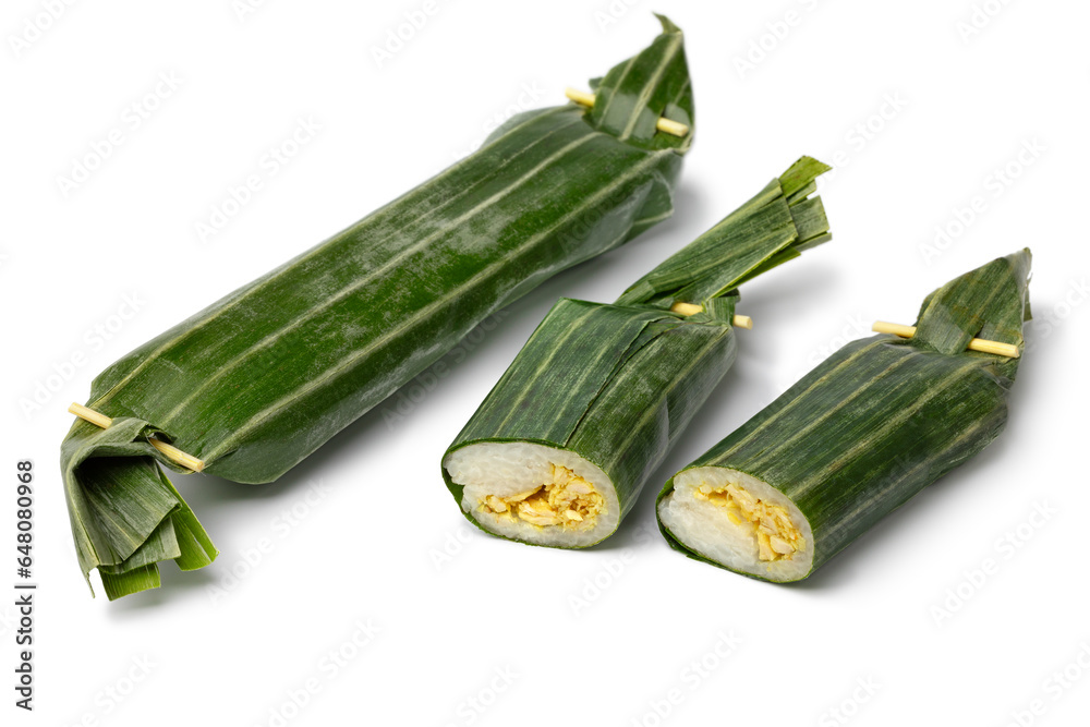 Whole and halved Lemper Ayam, an Indonesian savoury snack made of ...