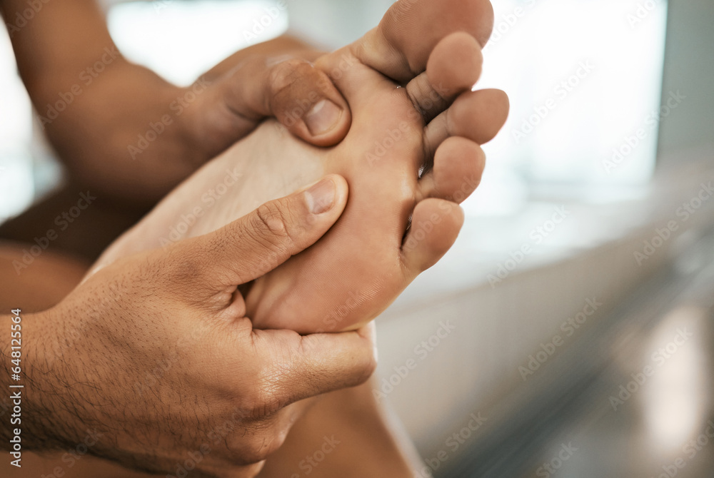 Foto de Hands, foot pain and massage with a person in physiotherapy to ...