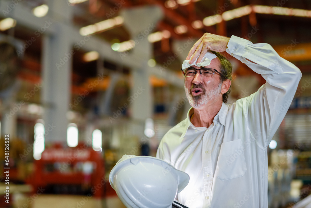 boss manager engineer with helmet tired in construction factory heavy ...