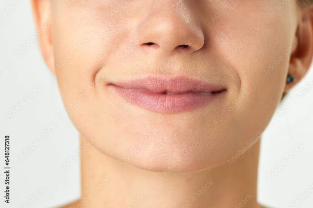Cropped image of female face, nose, lips and chin isolated on white ...