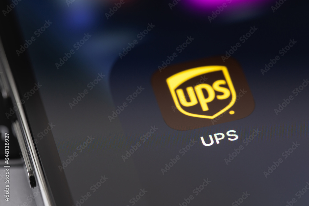 UPS mobile app on a screen smartphone closeup. United Parcel Service ...